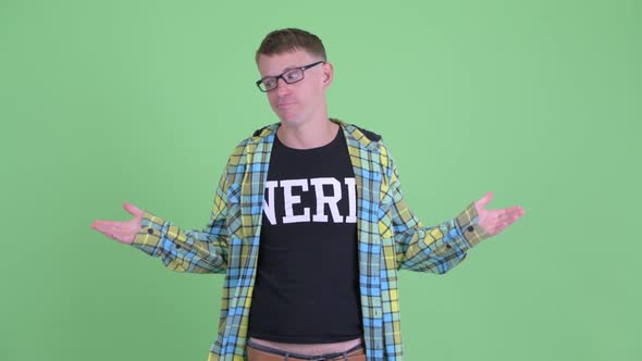 Portrait of Confused Nerd Man Shrugging Shoulders, Stock Footage ...