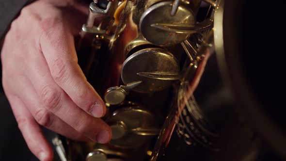 Artist Presses the Saxophone Valves with Fingers Closeup, Stock Footage