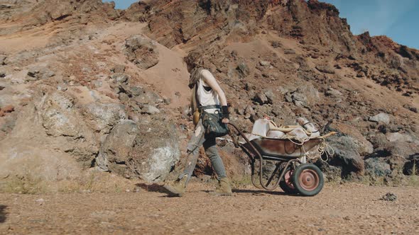 Female Survivor Pulling Cart in Post Apocalypse World by AnnaStills