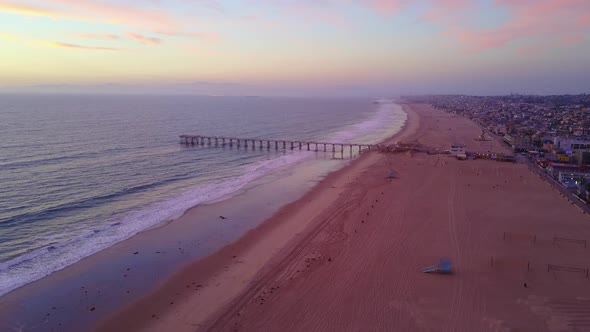 Aerial drone view of a sunset at the beach over the ocean, Stock Footage