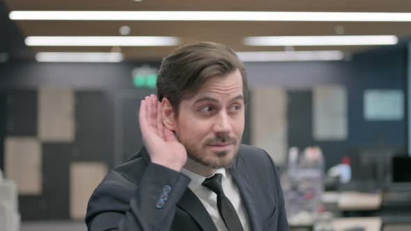 Businessman Trying to Listen Secret Information, Stock Footage | VideoHive