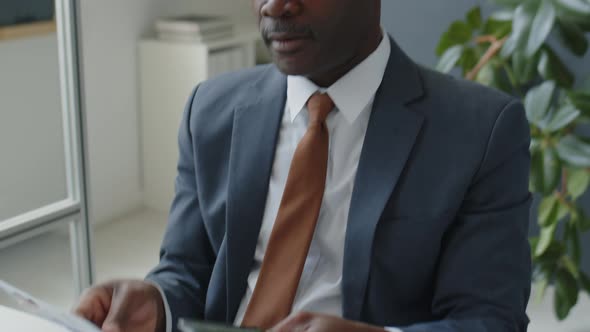 Consulate Officer Checking Application Form and Asking Questions, Stock ...