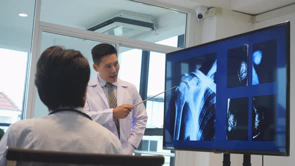 Doctor present x-ray and meeting team, Stock Footage | VideoHive