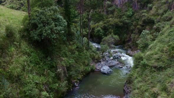A small mountain stream in the Andes made up of numerous small cascades ...