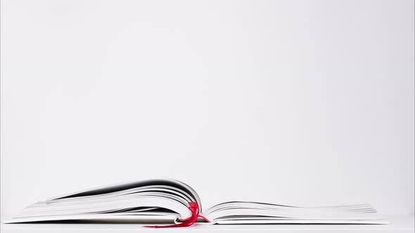 Stop Motion Video of Flipping or Turning the Pages of a Large Book ...