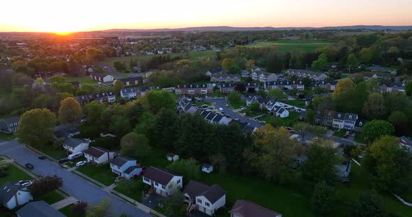 Small town neighborhood in spring. Aerial establishing shot of houses ...