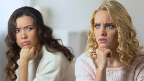 Two Offended Female Friends Sitting Separately, Upset About Quarrel ...
