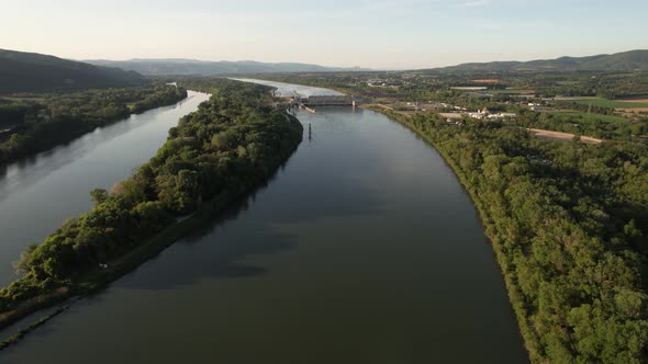 Aerial shoot of renewable energy, hydroelectric power plant in France ...