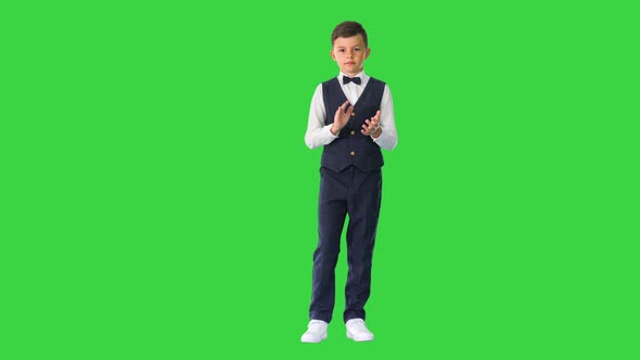 Smiling Boy in Formal Wear Clapping on a Green Screen Chroma Key, Stock ...