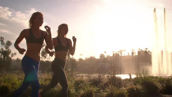Athletic Twins Running In The Park Slow-Motion, Stock Footage | VideoHive