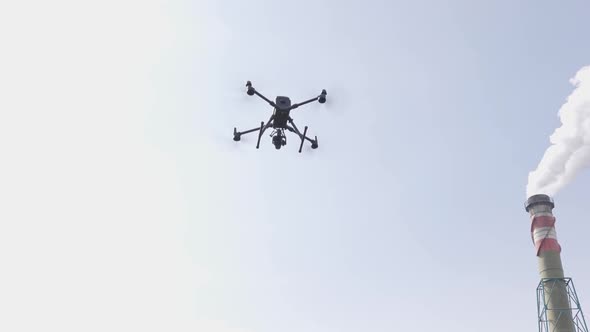 Industrial Big Drone Flying on Industrial Plant - Cinematic Slow Motion ...