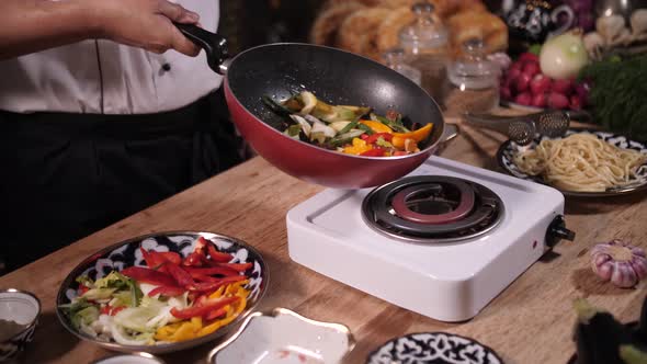 frying vegetables in a pan, Stock Footage | VideoHive