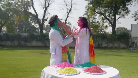 Beautiful Indian couple playing Holi, Stock Footage | VideoHive