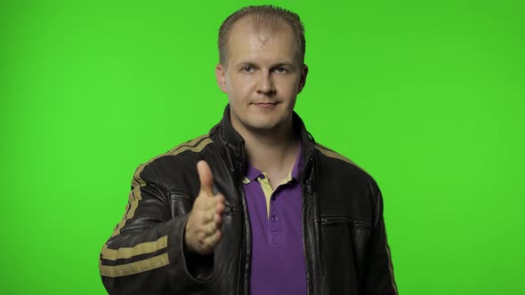 Man Rocker Offering Handshake, Greeting with Kind Smile, Welcoming ...