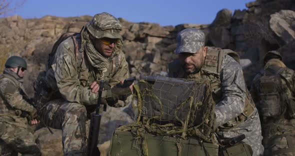 Armed Soldiers Looking at a Computer, Stock Footage | VideoHive