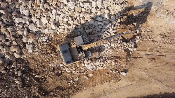 Overhead View of Excavator in Open Air Quarry, Stock Footage | VideoHive