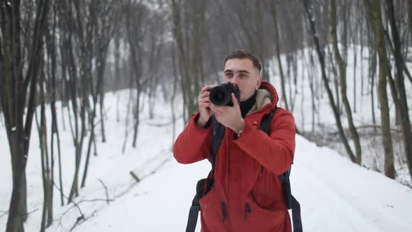 Photographer Taking Photo in Forest, Stock Footage | VideoHive