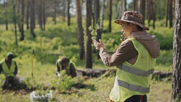 Forester Talking on Cellphone, Stock Footage | VideoHive