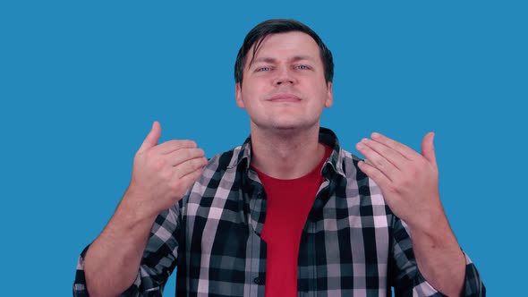 A portrait of a man smells good. Positive human facial expressions ...