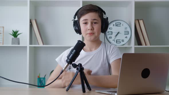Boy Vlogger Look at Camera and Recording Podcast Video for Internet ...