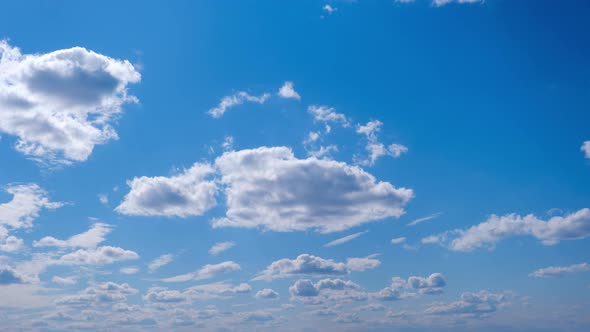 White Clouds Move and Dissolve in the Blue Sky Timelapse, Stock Footage