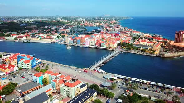 Truck right aerial view of the Otrobanda and Punda districts of ...