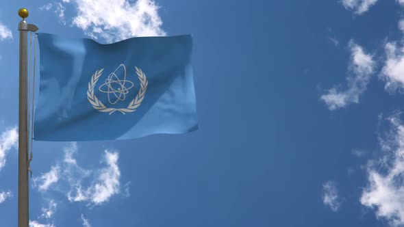 Iaea Flag International Atomic Energy Agency Flag On Flagpole, Motion ...