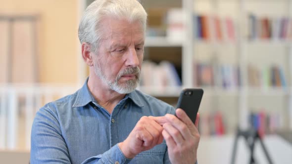 Old Man Using Smartphone, Stock Footage | VideoHive