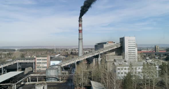 Front View of Coal-fired Plant Smokestack Emits Black Smoke, Stock Footage