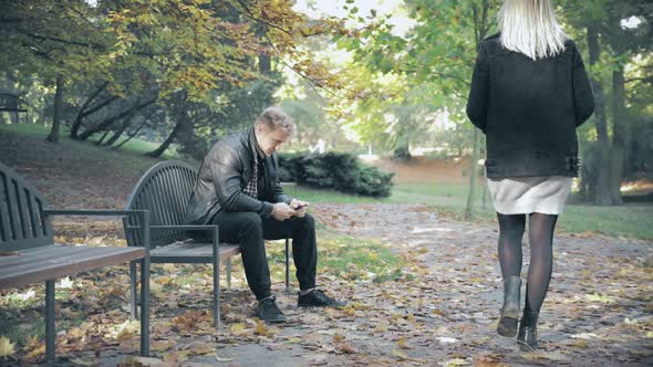 A woman gets angry at a man in a park who leers at her and makes ...