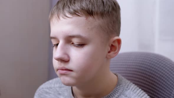 Face of a Sad Guilty Child with Downcast Eyes, Stock Footage | VideoHive