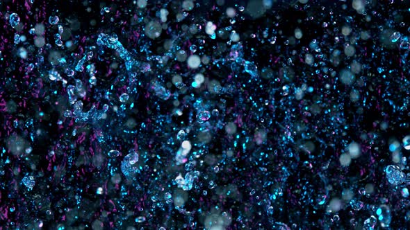 Super Slow Motion Abstract Shot of Splashing Neon Water at 1000fps ...