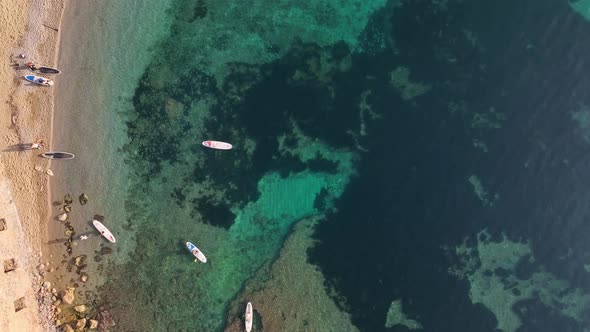 Sup surfing group aerial view 4 K Turkey Alanya, Stock Footage | VideoHive