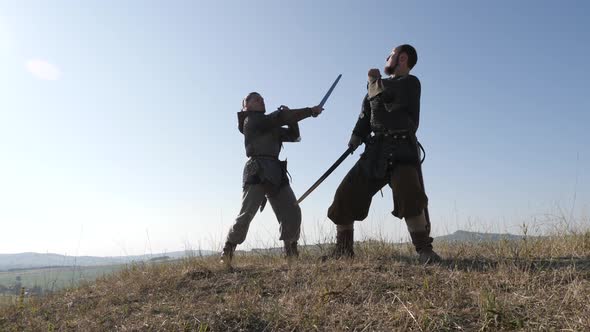 Brave medieval men fighting on a hill, Stock Footage | VideoHive