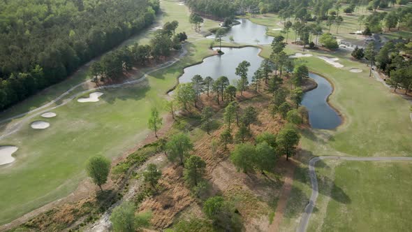 Magnolia Greens Golf Course aerial high above orbiting, Stock Footage