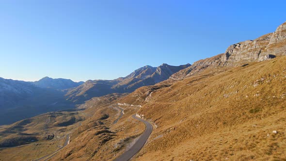Aerial Shot of a Road in Mountains Through the Sedlo Pass Bobov Kuk ...