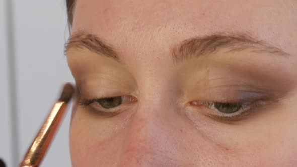 Beautiful Shiny Shadows are Applied with a Special Brush on the Eyelid ...