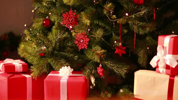 Blinking lights on christmas tree with presents, Stock Footage | VideoHive