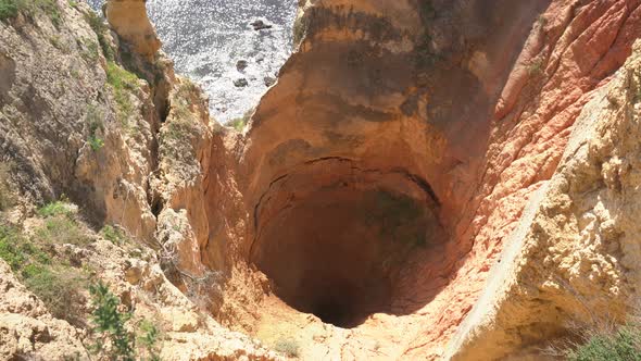 Hole in a cliff on the seashore, Stock Footage | VideoHive
