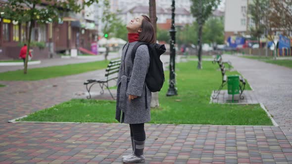 Wide Shot Side View of Happy Smiling Little Person Looking Up Breathing ...