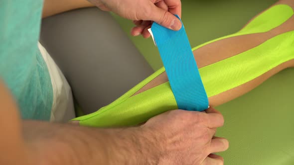 Closeup Taping Quadriceps, Stock Footage | VideoHive