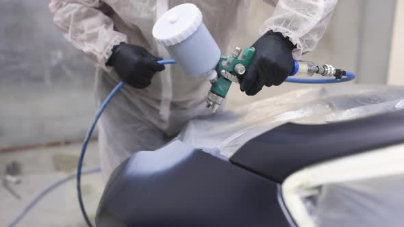 Painting Vehicle Parts at Car Service Workshop Industrial Spray ...