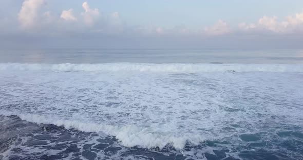 low forward shot of sea wave. drone view of sea waves in Indonesia. sea ...