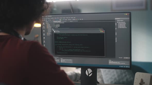 Male Programmer Creating Code at Home, Stock Footage | VideoHive