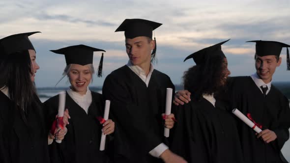 Mixed Races Happy Students in Classic Graduation Mantles and Academic ...