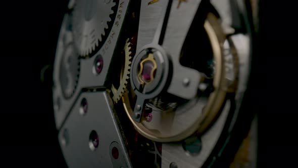 Disassembled Vintage Pocket Watch with Clockwork Turning on Black ...