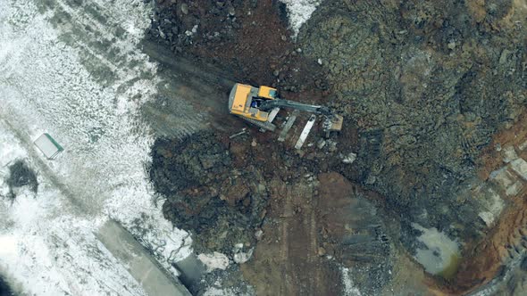 Top View of an Excavator Digging Frozen Soil, Stock Footage | VideoHive