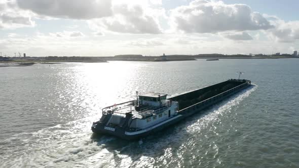 Aerial of Dutch cargo ship on the western scheldt in the Netherlands ...