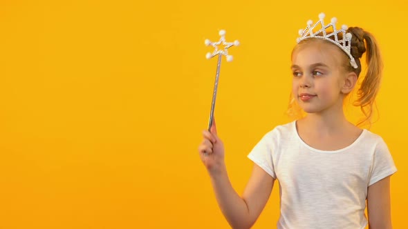 Beautiful Princess Girl Waving Magic Wand and Smiling at Camera, Happy ...