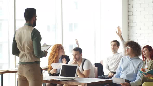 Business Consultant Giving a Lecture To Corporate Employees at Spacious ...